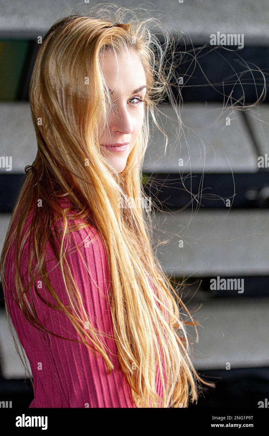 Rhianna Martin, a blonde woman spends the day having her picture taken ...