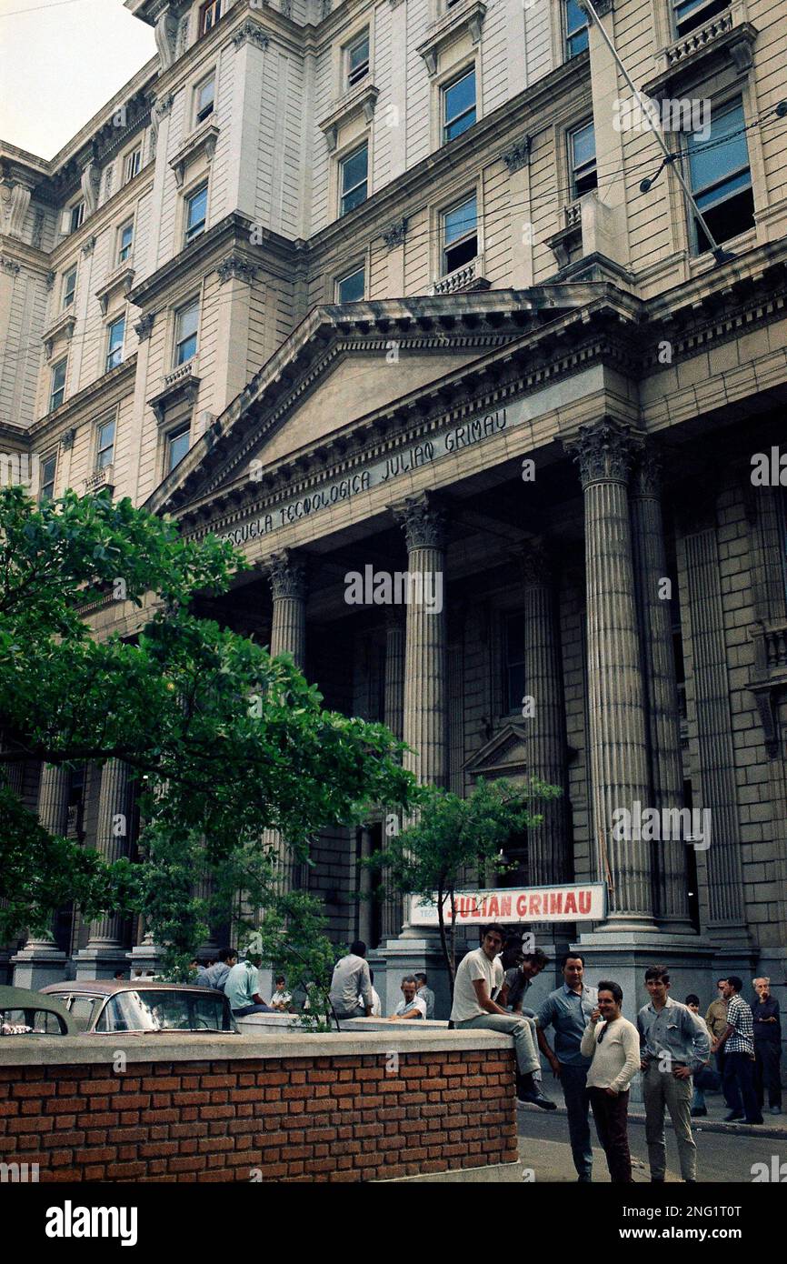 Students mill around outside the Escuela Tecnologica Julian Grimau ...