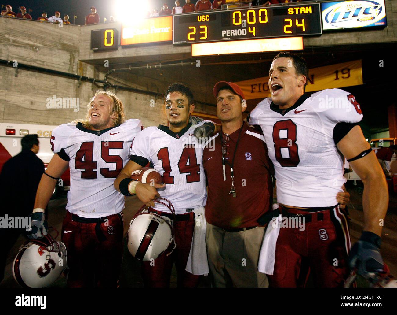 Stanford's Ben Ladner, Tavita Pritchard, coach Jim Harbaugh, and Evan ...