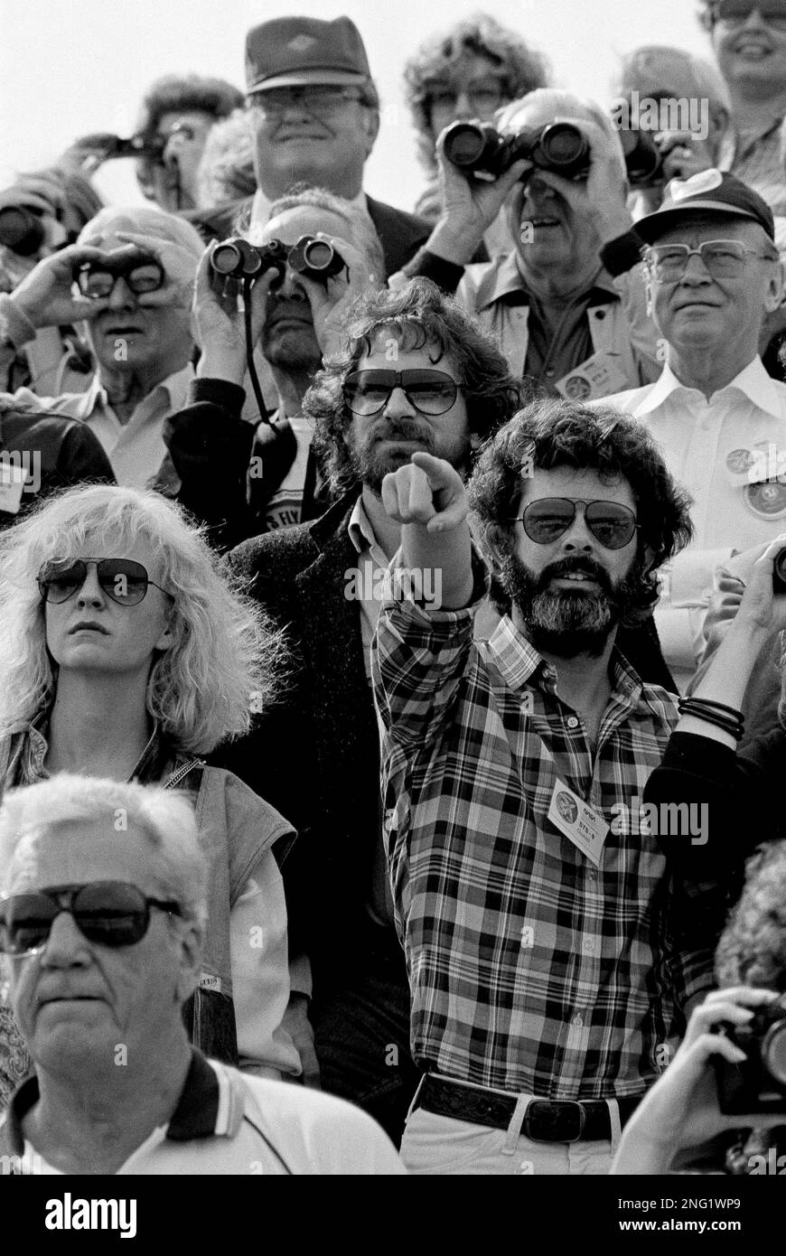 Film directors George Lucas, pointing, and Steven Spielberg, center ...