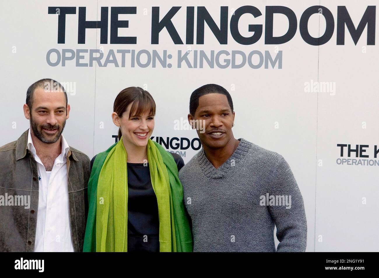 U.S. actors Ashraf Barhom, left, Jennifer Garner, center, and Jamie ...