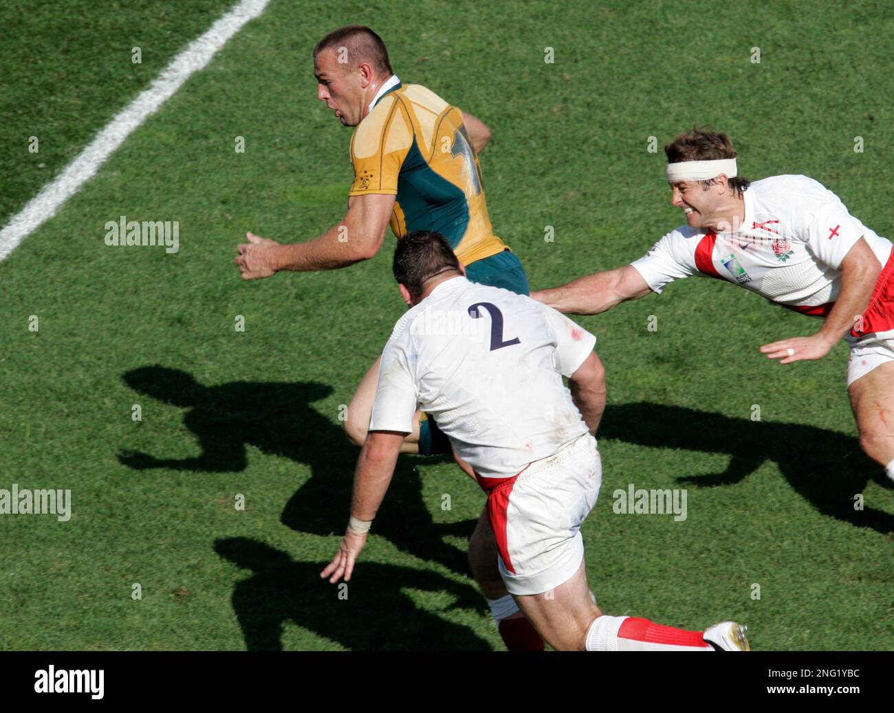 Australia's Chris Latham escapes England's Mark Regan during their ...