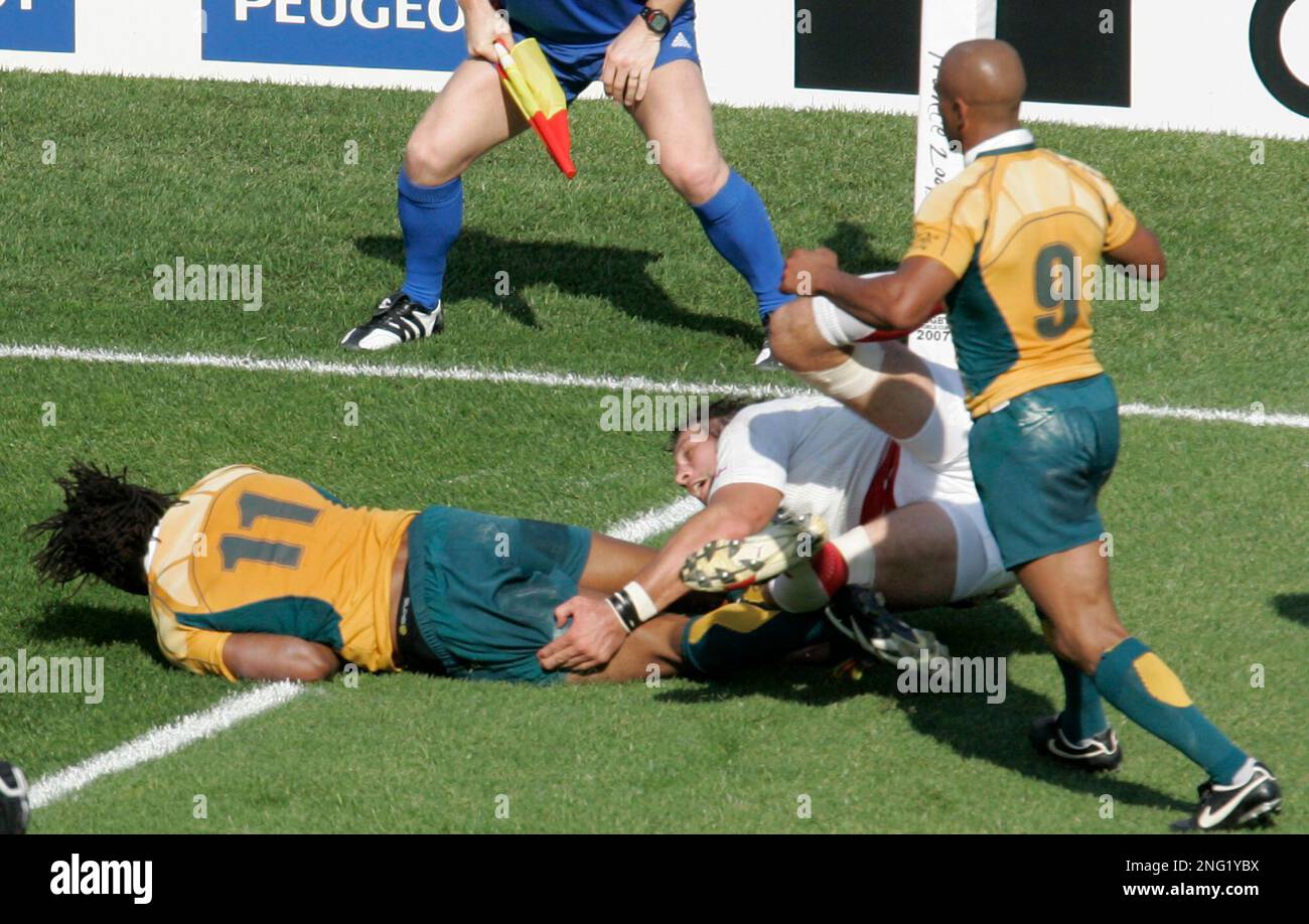 Australia's Lote Tuqiri (11) scores a try for Australia as teammates ...