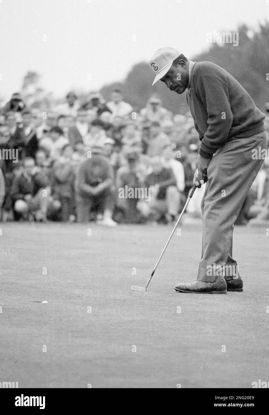 Golfer Charlie Sifford is shown in action during opening round of the ...
