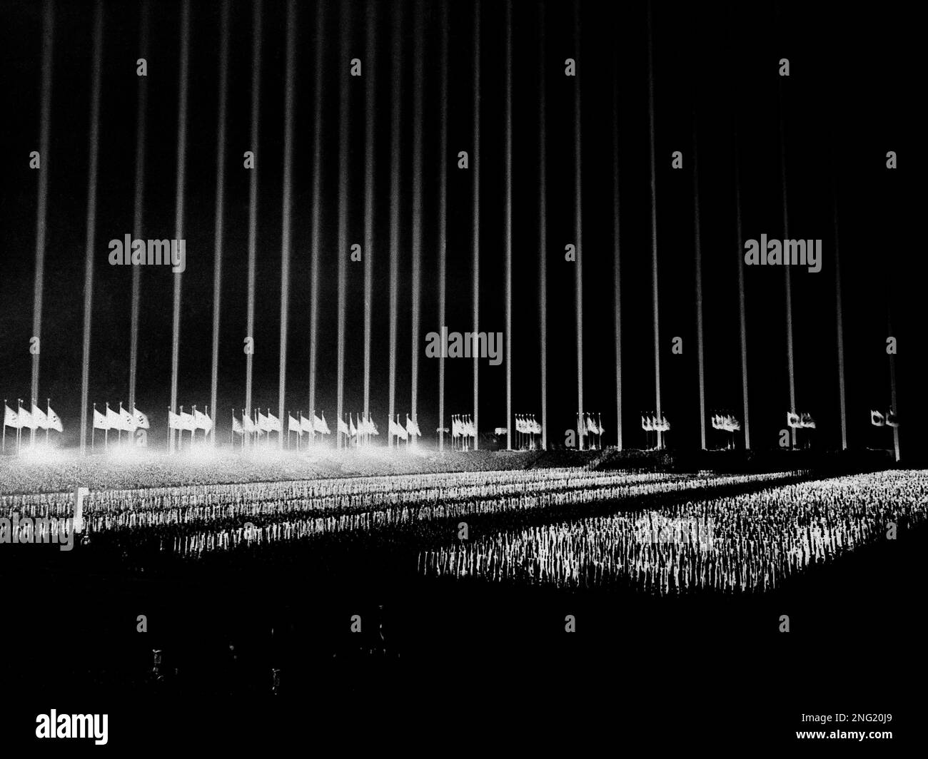 The scene at the Zeppelin Field at Nuremberg, with searchlights playing ...