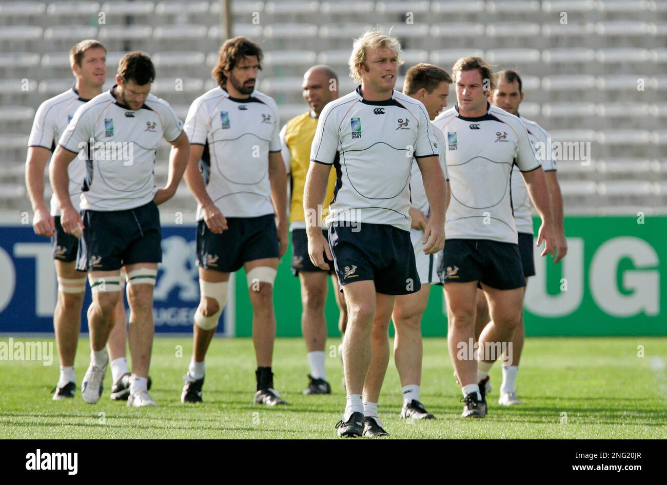 South Africa Rugby Union player Schalk Burger, center foreground, walks ...