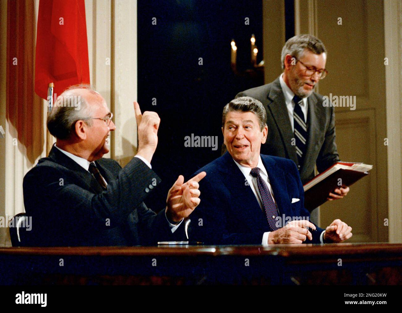 Soviet leader Mikhail Gorbachev gestures while talking with President ...