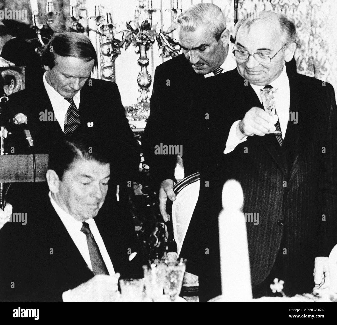 Soviet leader Mikhail Gorbachev toasts President Ronald Reagan during a ...
