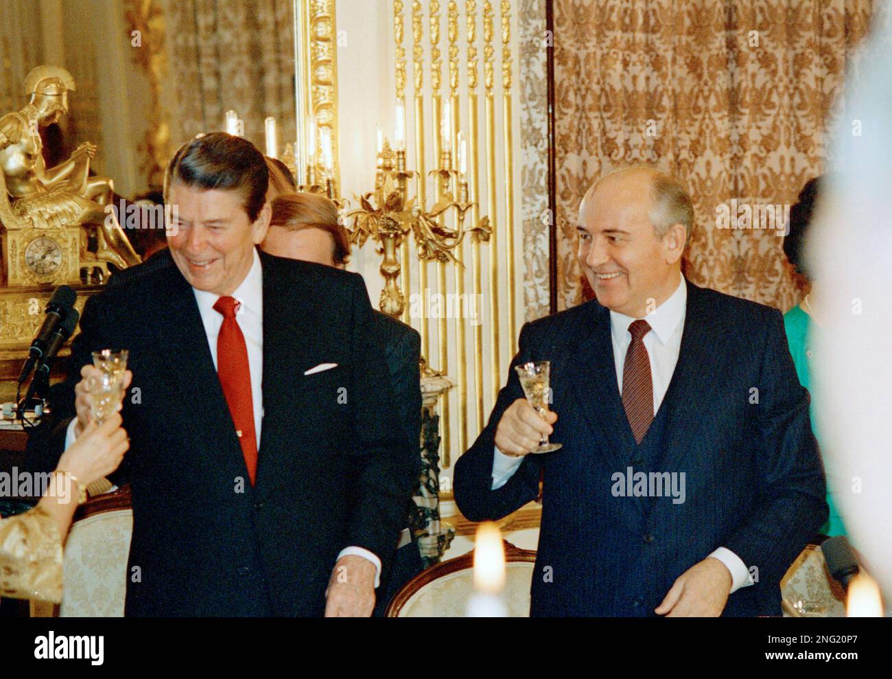 President Ronald Reagan and Soviet leader Mikhail Gorbachev share a ...