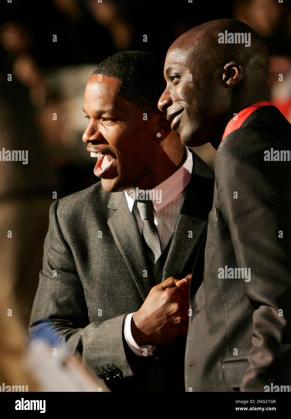 US actor Jamie Fox, left, poses for the photographers with an ...