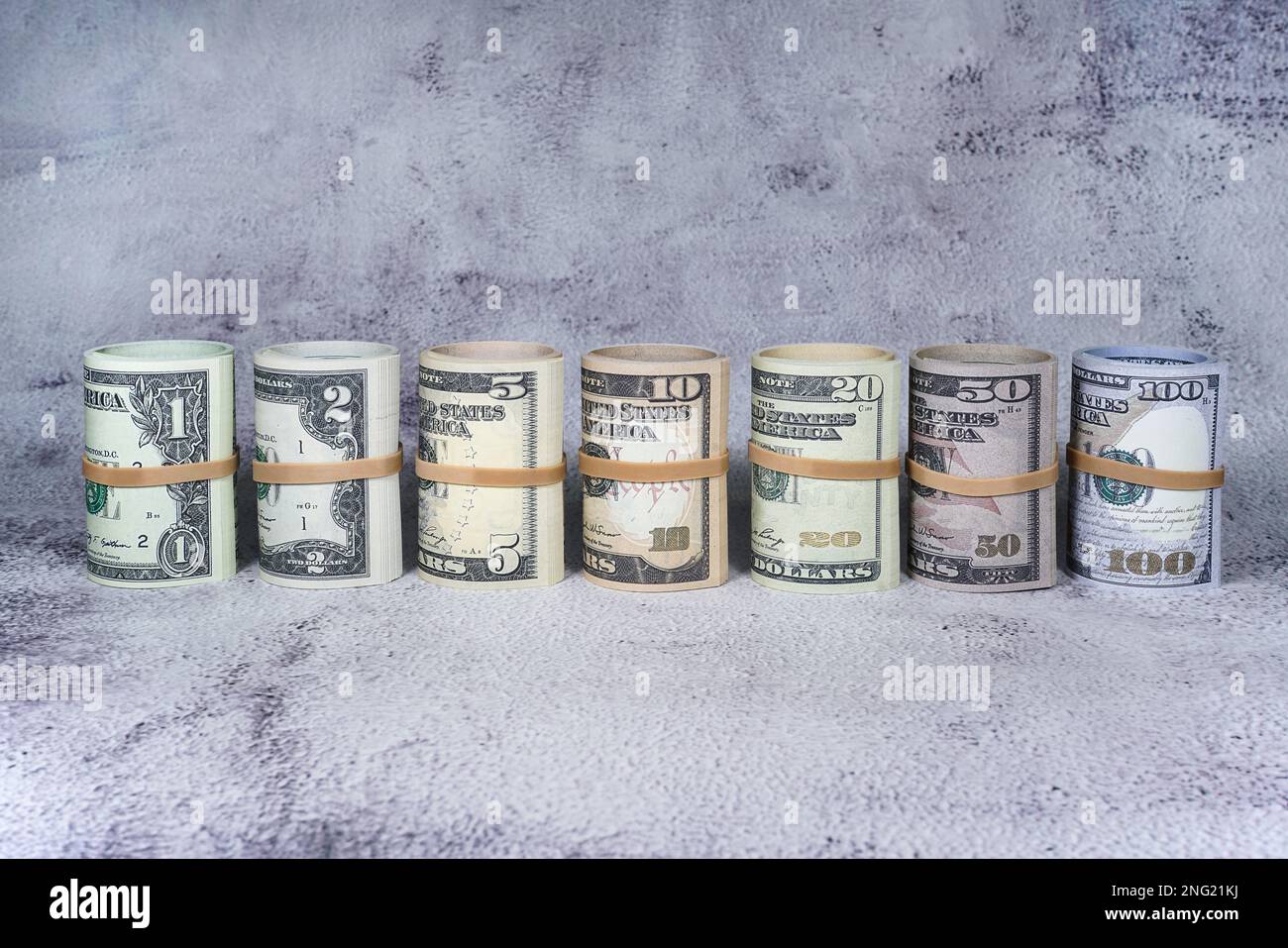 Rolls of fake or prop US paper currency Stock Photo - Alamy
