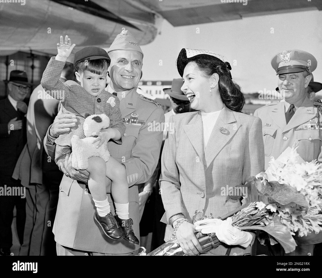 Gen. Matthew B. Ridgway, holding his son, Matt, jr., and Mrs. Ridgway ...