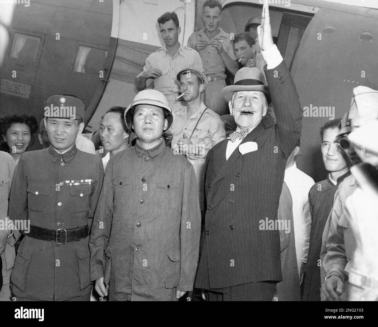 U.S. Ambassador Patrick J. Hurley waves to friends as he arrived at ...