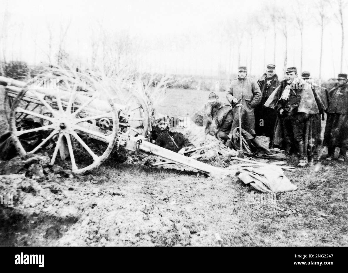 French field gun in position during World War I. The gun is mounted ...