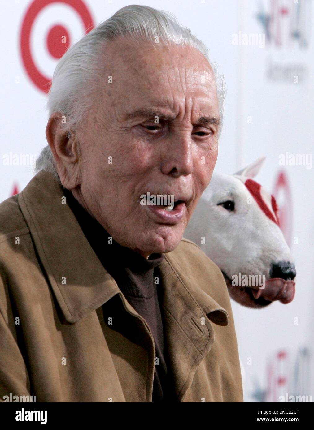 Actor Kirk Douglas is seen with Target's mascot, a white bull terrier ...