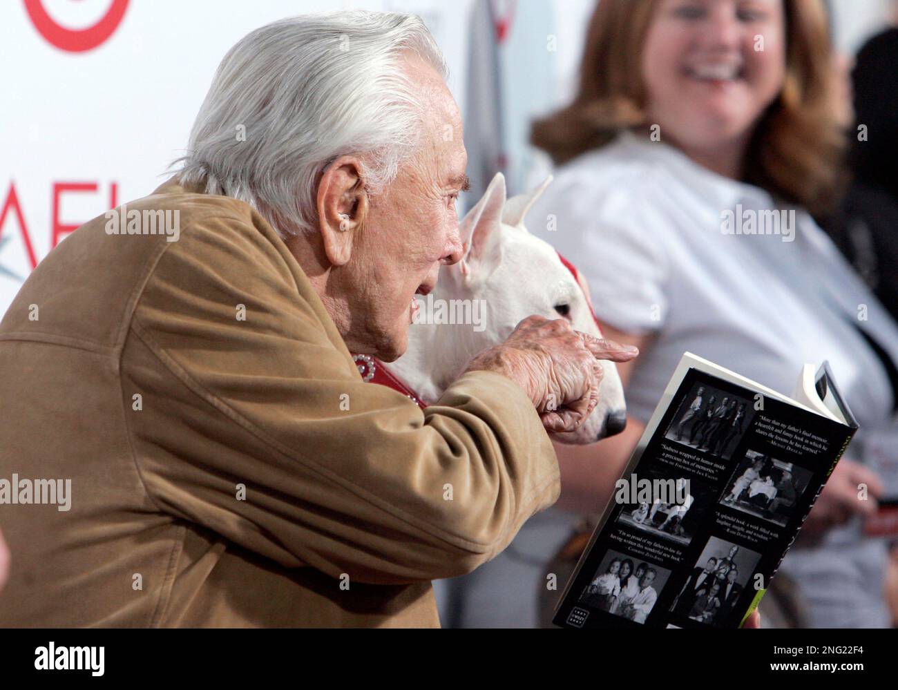 Actor Kirk Douglas read his book to Target's mascot, a white bull ...