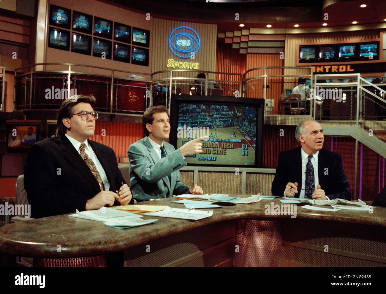 The CBS-TV sports anchors team of Mike Francesa, left, Jim Nantz ...