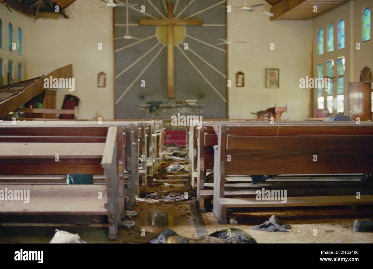 Rotting corpses of a woman and child at St. Peter's Lutheran Church in ...