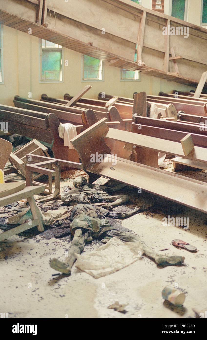 Rotting corpses of a woman and child at St. Peter's Lutheran Church in ...