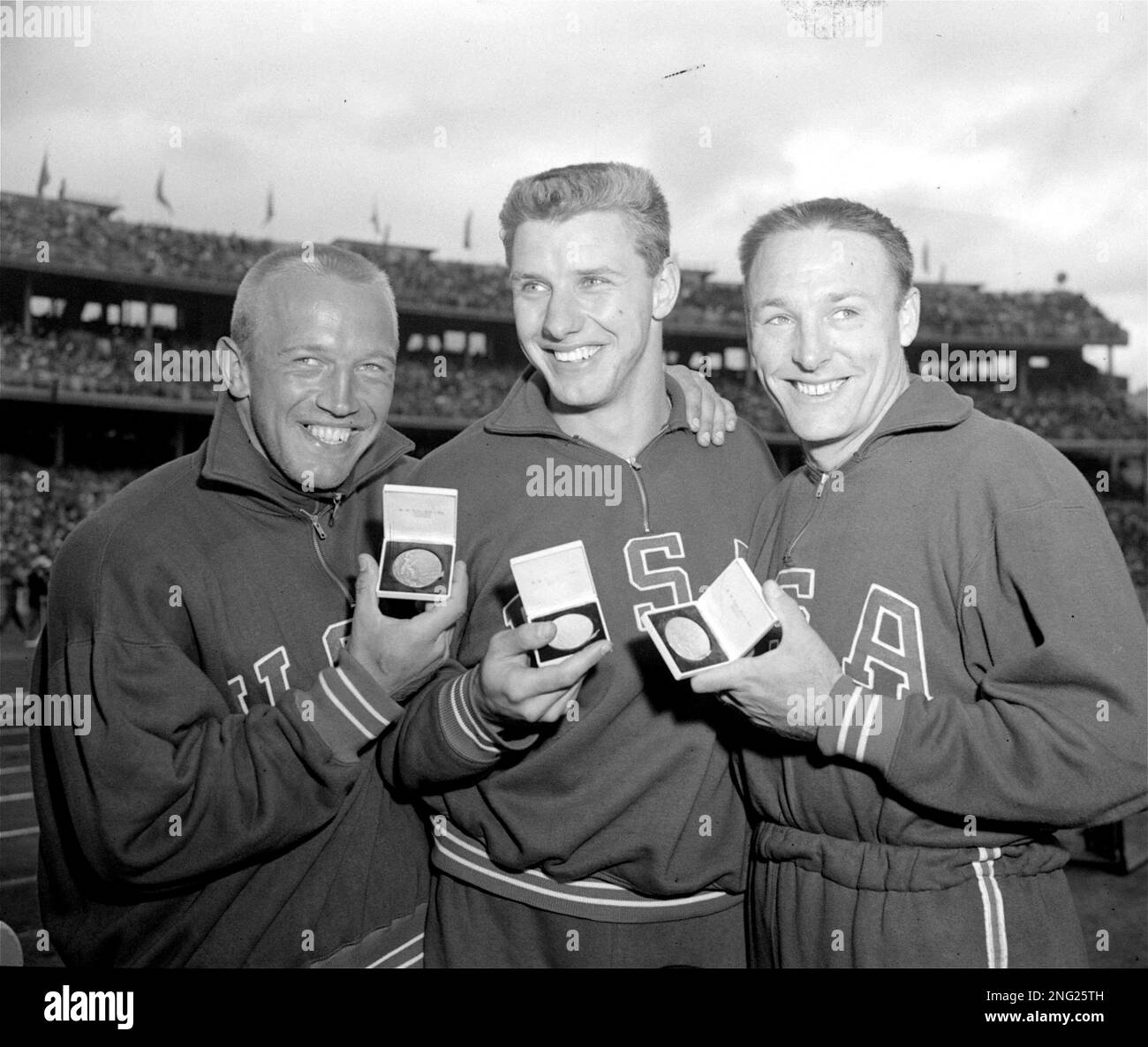 ** FILE ** Three United States discus throwers who took top honors in ...