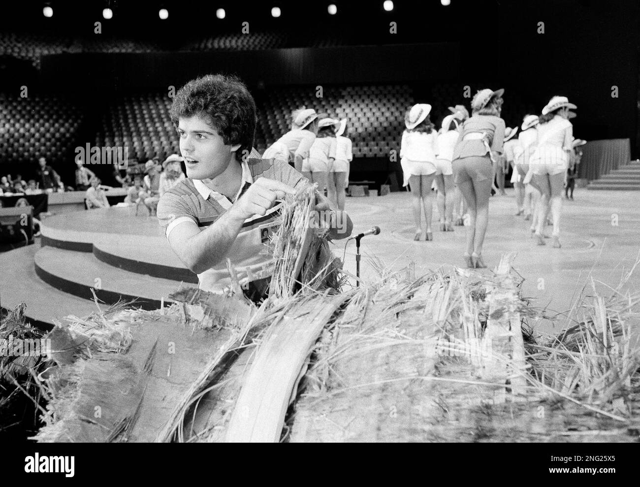 Pop singer Donny Osmond points to a section of Skylab that was brought ...