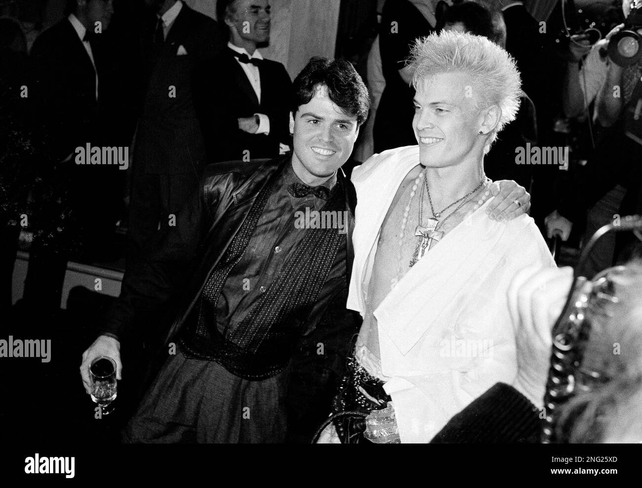 Pop singer Donny Osmond, left, and new wave singer Billy Idol share a ...