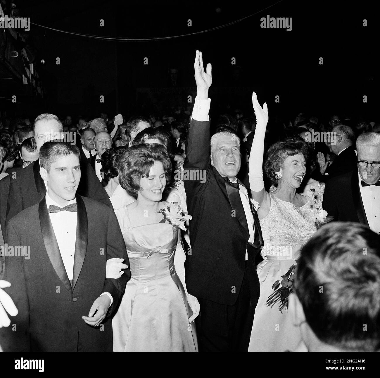 After leading the grand march through a jammed packed-over crowed ...