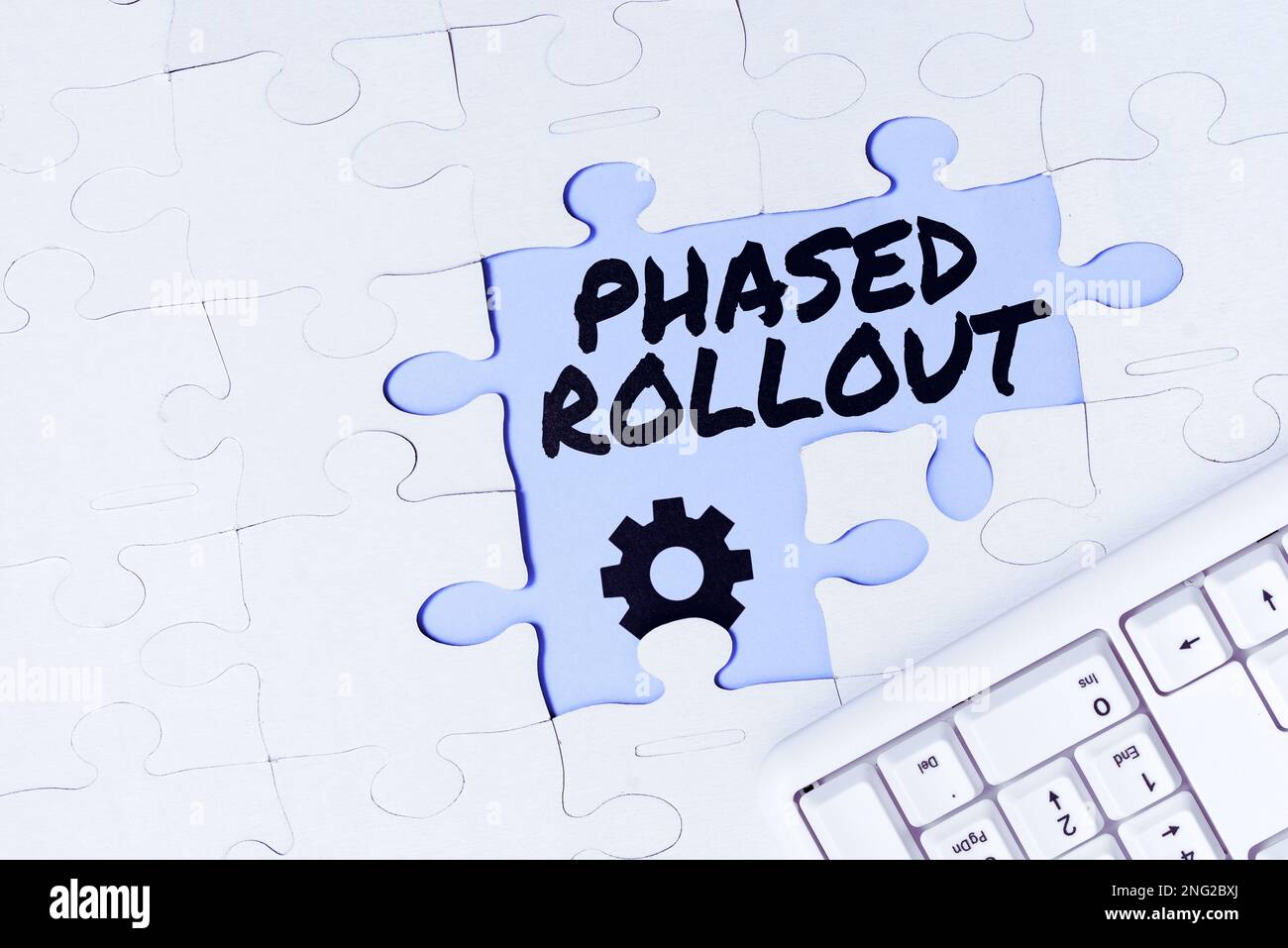 Hand writing sign Phased Rollout. Conceptual photo the practice of ...