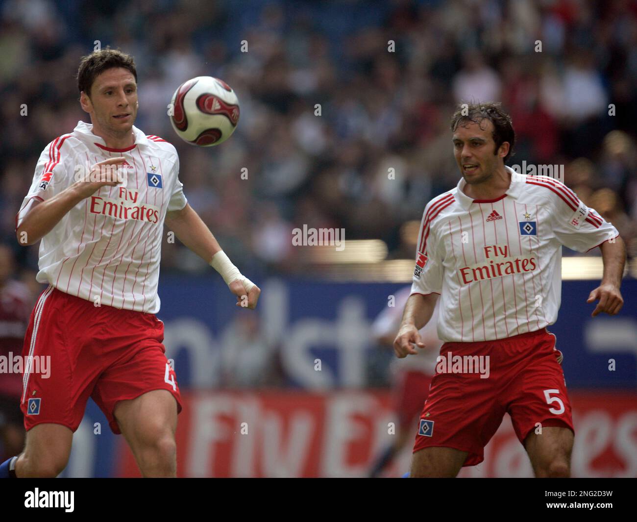 Hamburg's Bastian Reinhardt, left, and Joris Mathijsen, right, seen ...
