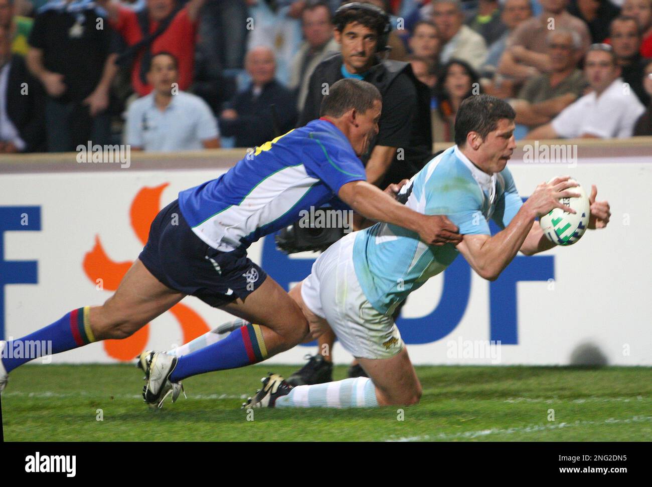 Argentina's Manuel Contepomi, right, breaks the tackle of Namibia's ...