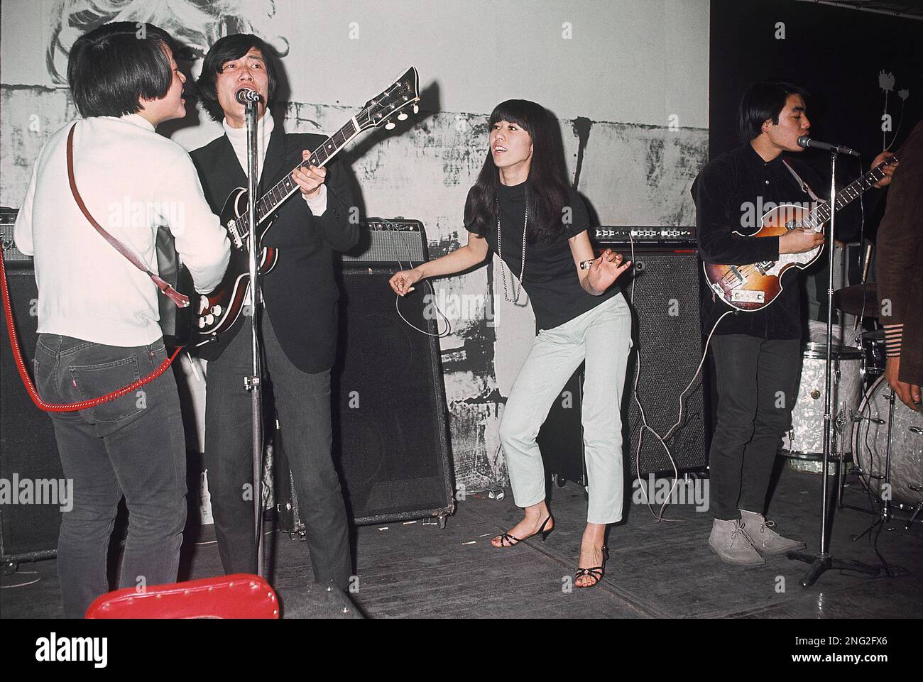 Guitar players and dancers at a discotheque in Tokyo, Japan, Jan. 1967. Such young people ...