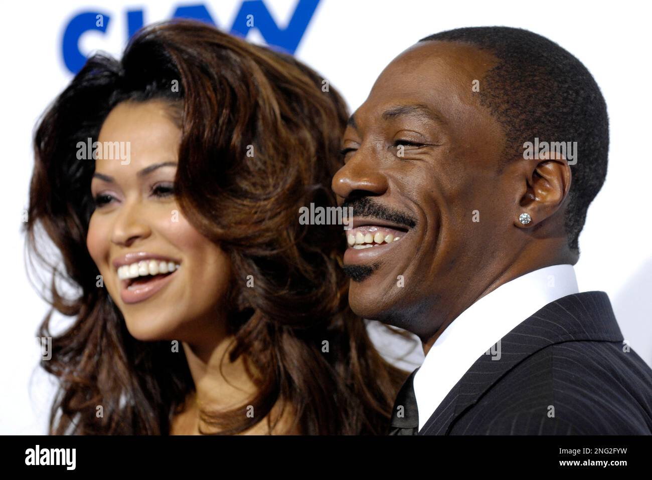 Eddie Murphy and his girlfriend Tracey Edmonds share a laugh at the ...