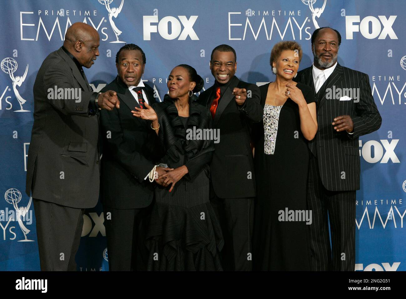 The cast of "Roots" poses for photographers backstage at the 59th ...