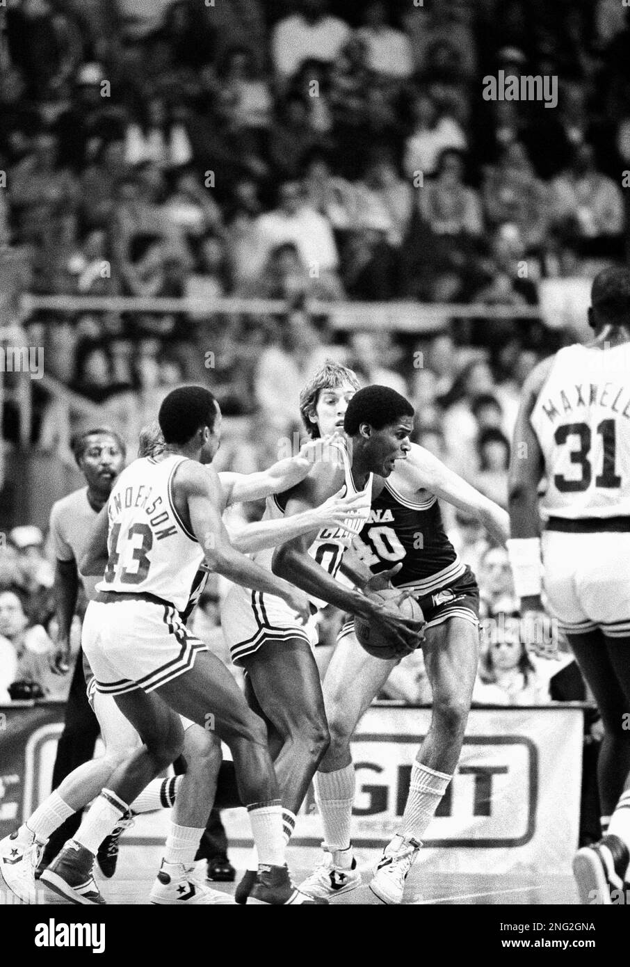 Boston Celtics Robert Parish, 00, heads for the basket despite the ...