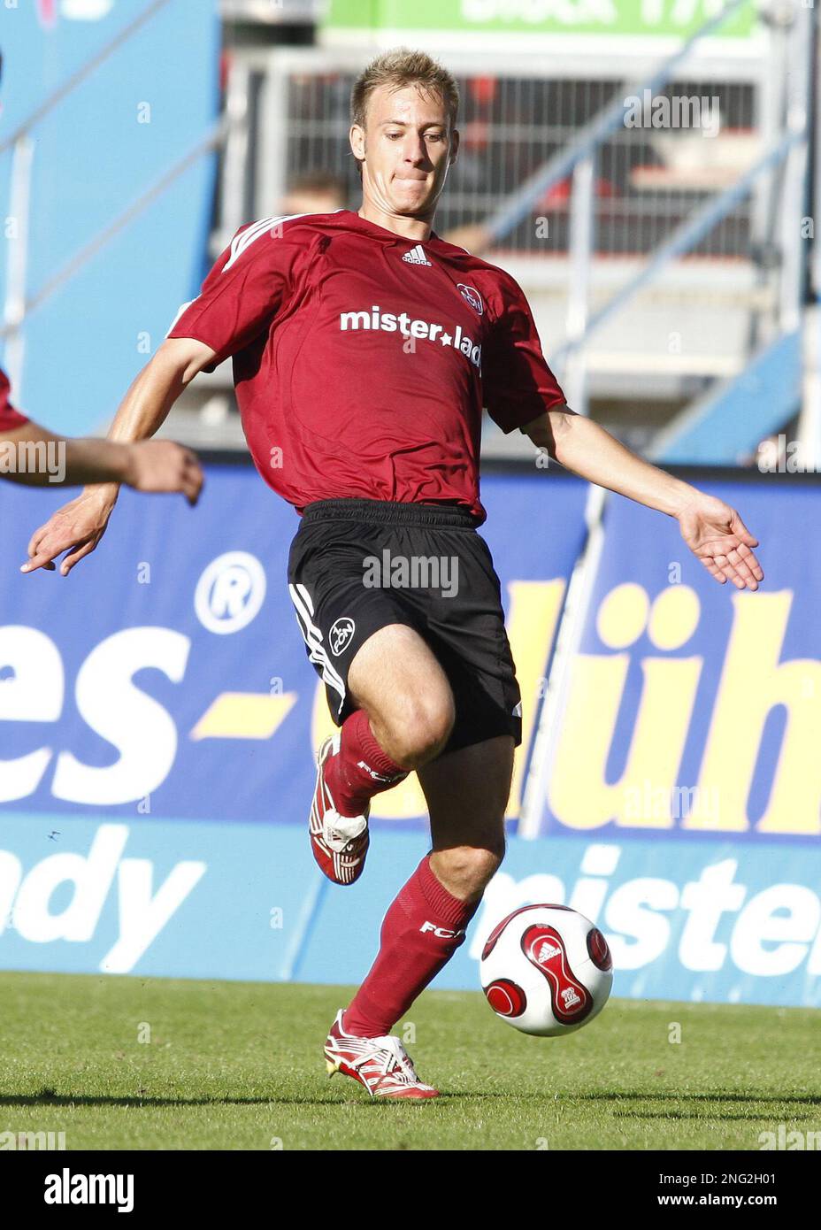 Dominik Reinhardt from Nuremberg goes for the ball during the German ...