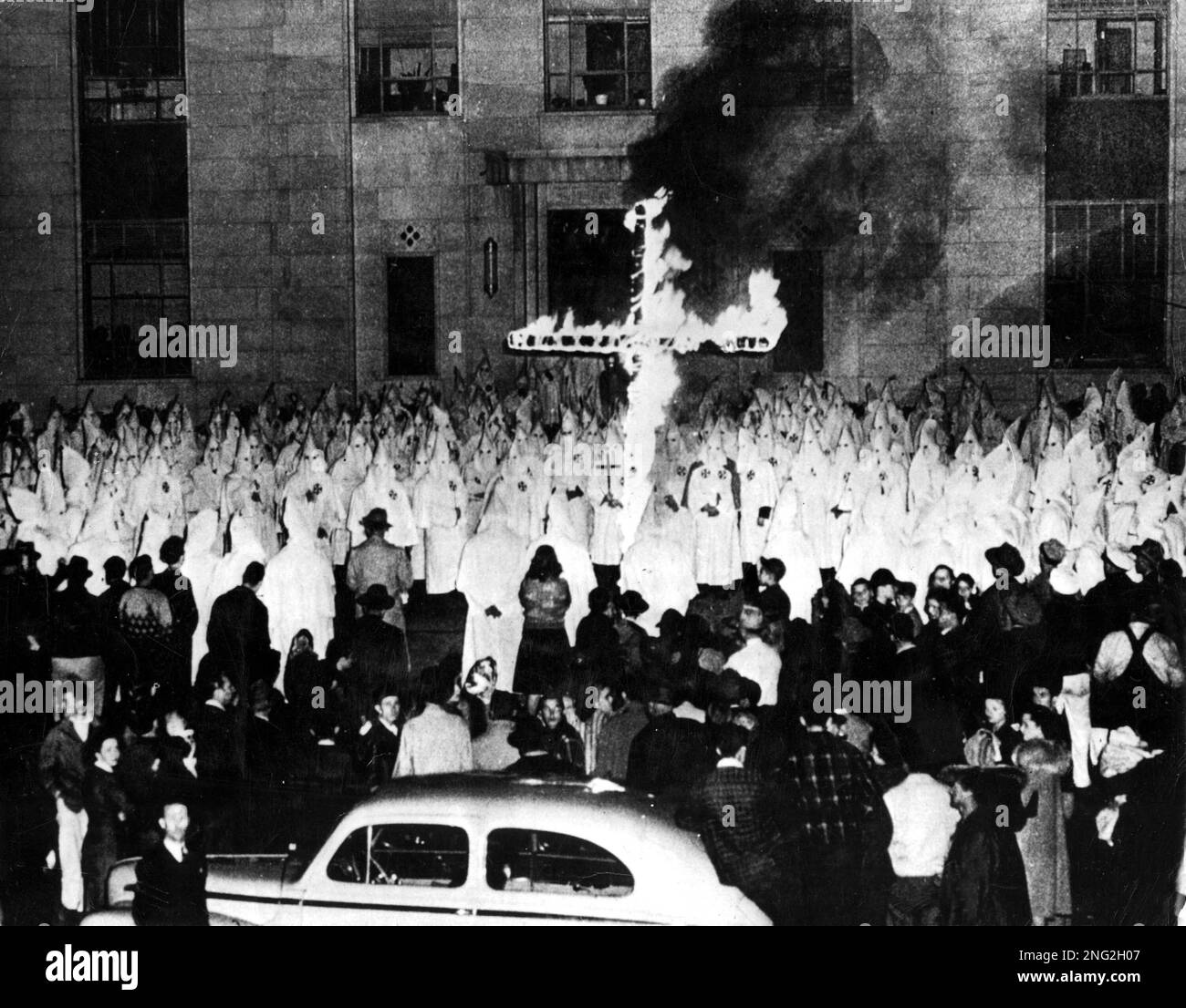 Ku Klux Klansmen burned a cross before the Emanuel County Courthouse ...