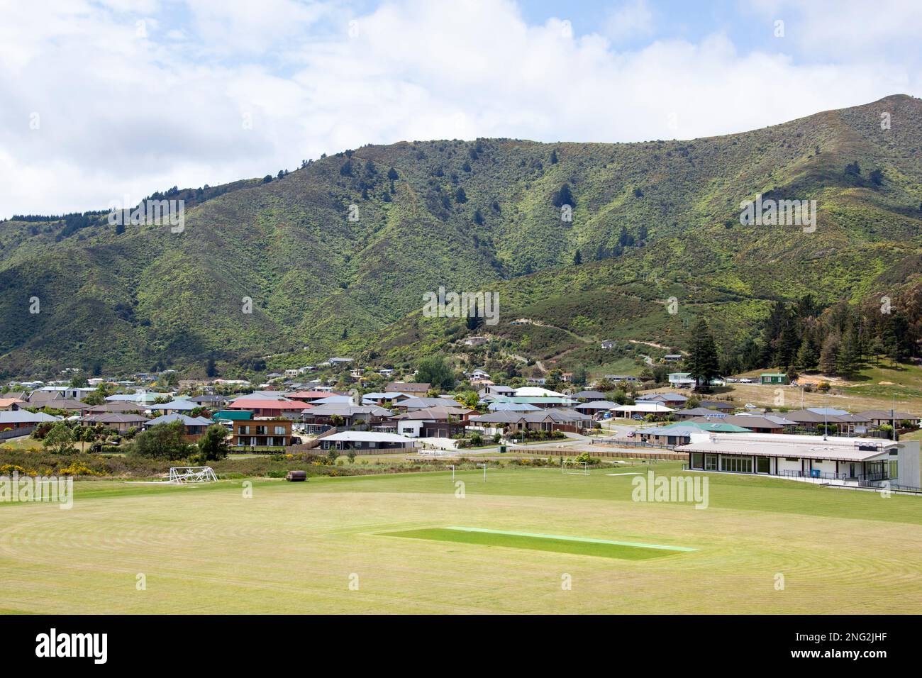 The view of Picton resort town stadium on wide lawn area and green ...