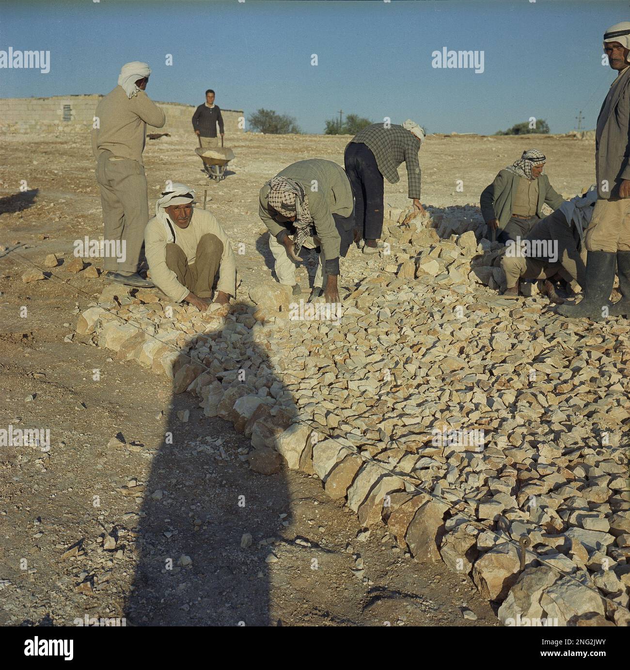 Arab workers prepare a new approach road to Bethlehem from Jerusalem ...