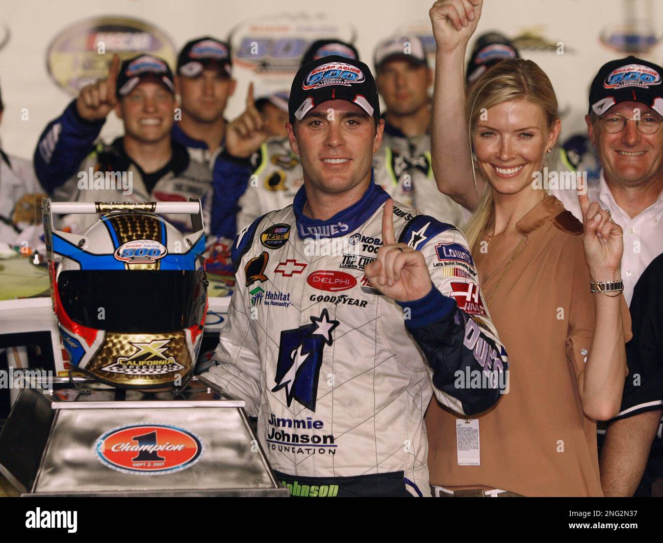 Jimmie Johnson is seen with his wife Chandra Johnson after winning the ...