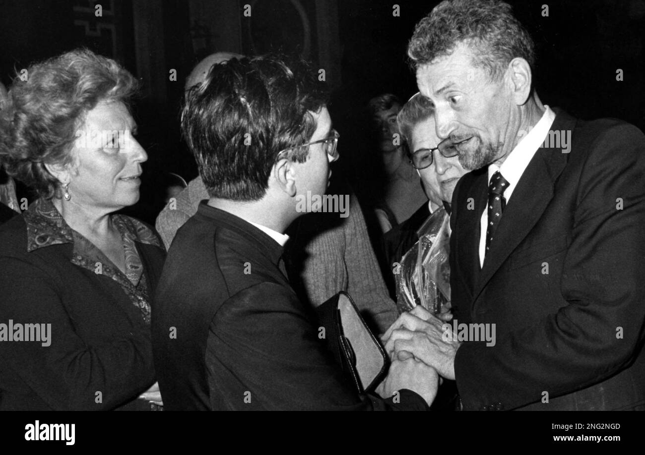 Edoardo Luciani, brother of the late Pope John Paul I, right, talks to ...