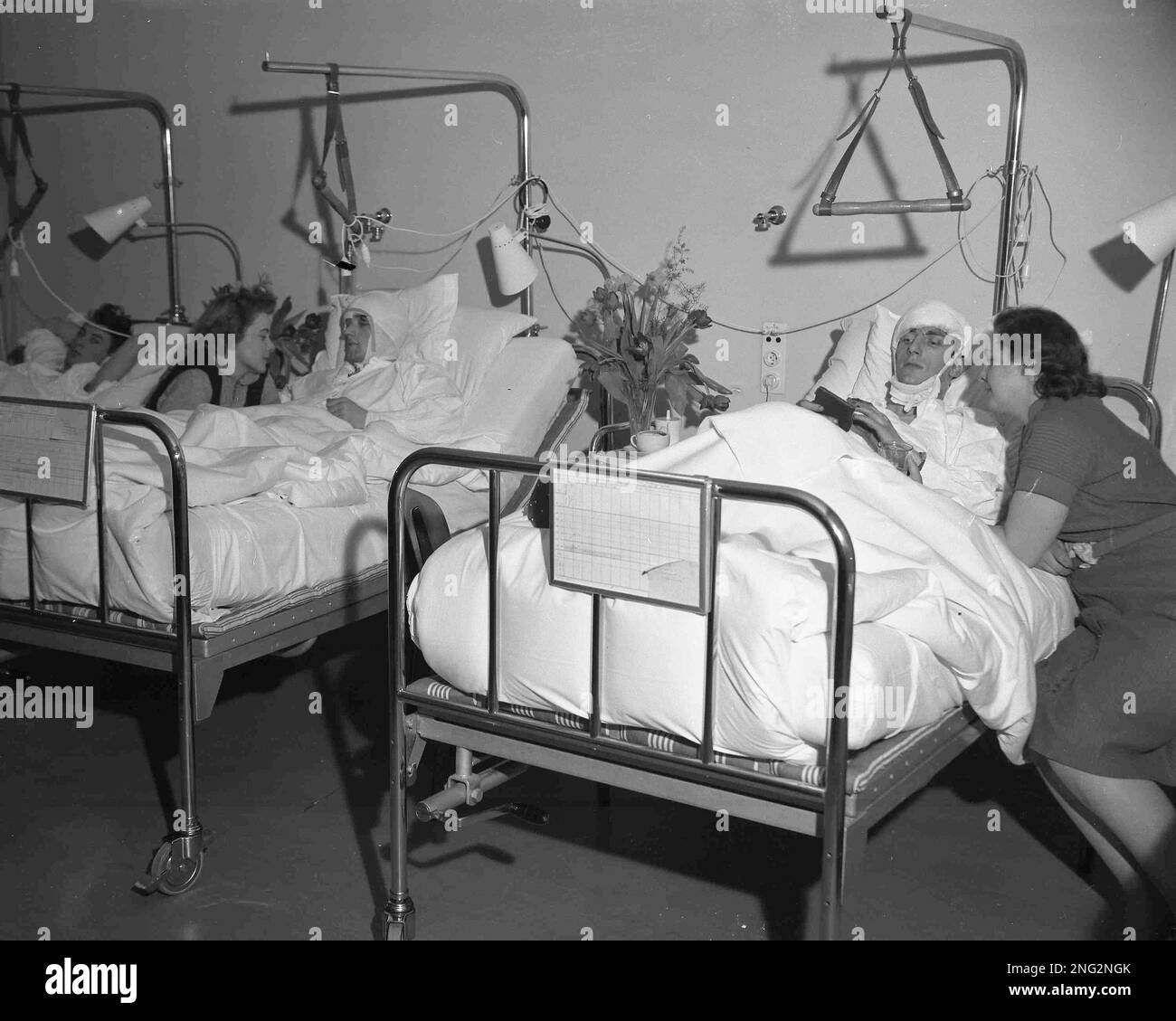 Manchester United footballer Dennis Viollett, right, talks with his ...