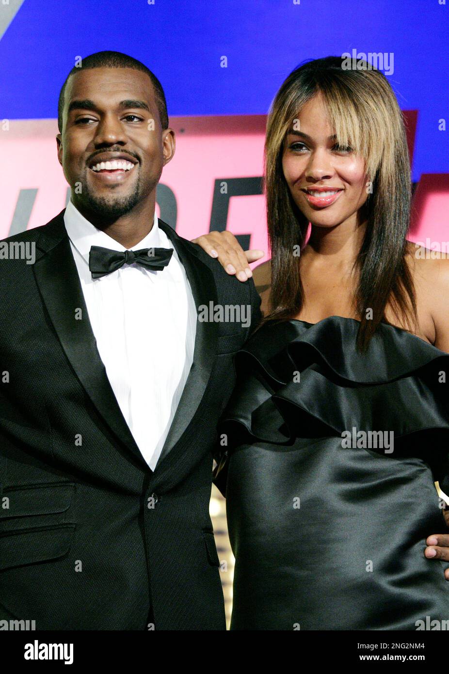 Kanye West, left, and his fiance Alexis Phifer arrive at the MTV Video ...