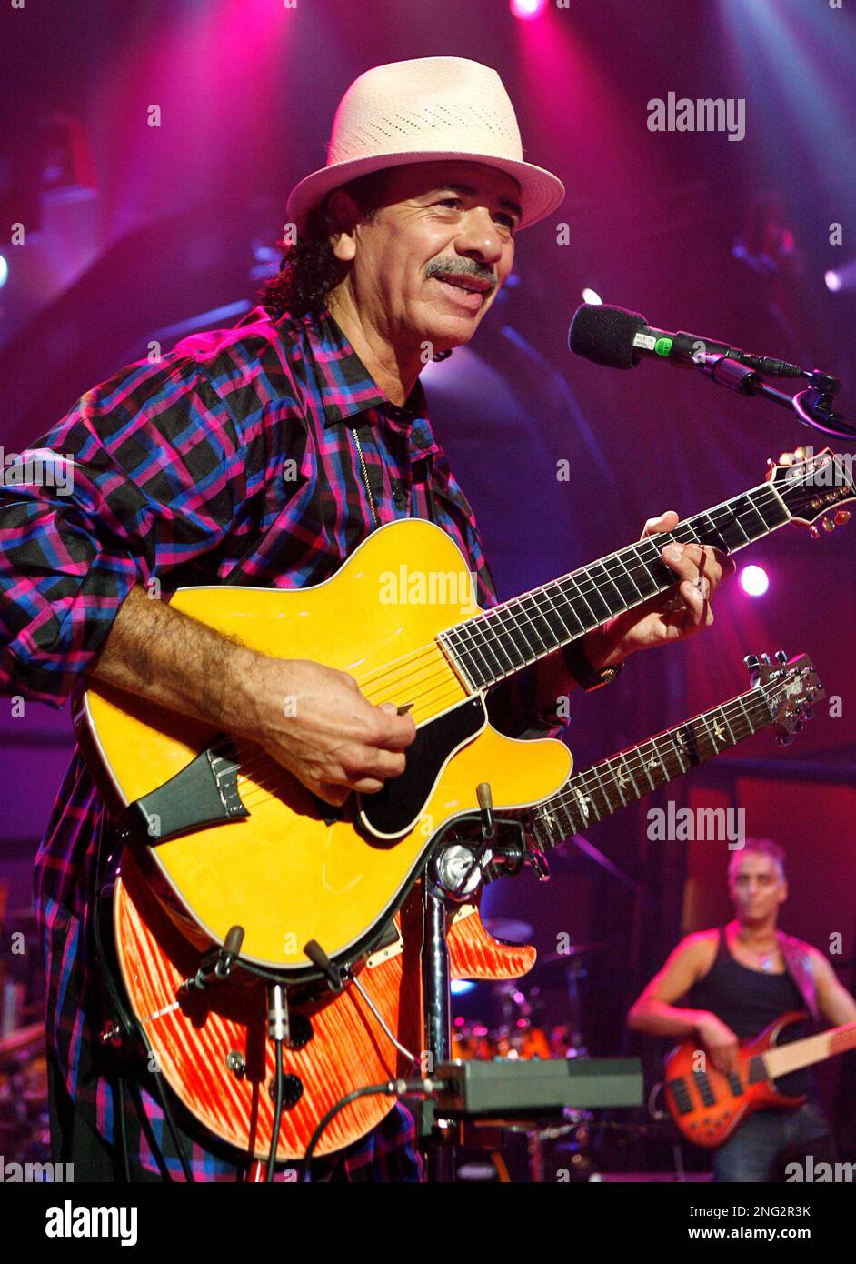 Carlos Santana performs with his band, Santana, as part of Nissan Live ...