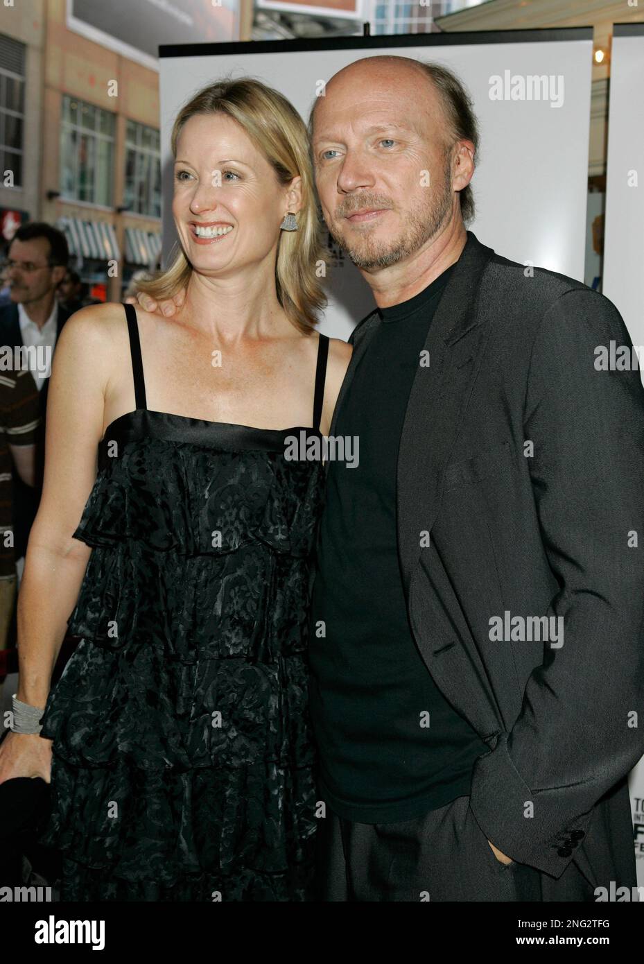 Director Paul Haggis and his wife Deborah Rennard attend the premiere ...