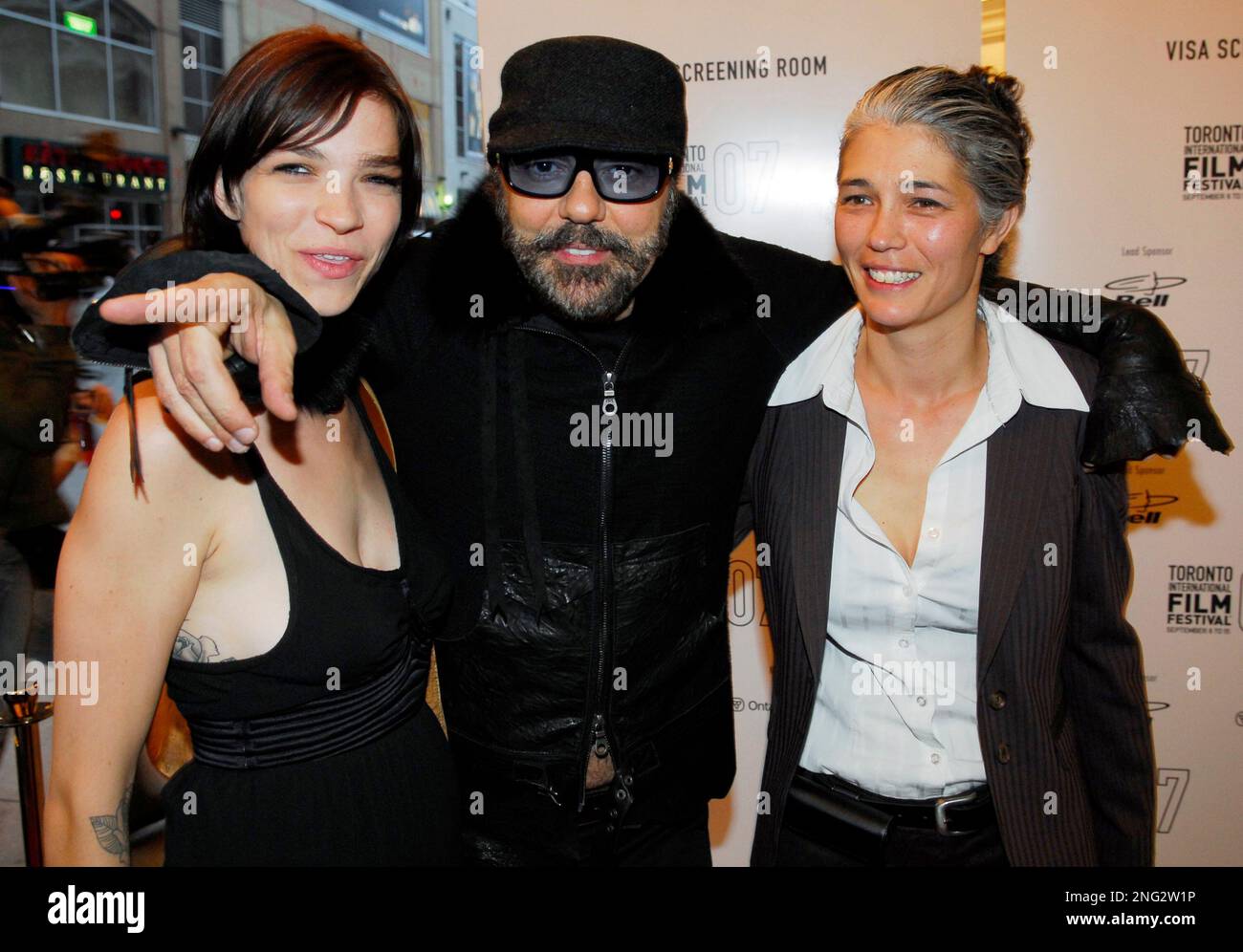 Singer and producer Daniel Lanois, centre, arrives for the gala ...