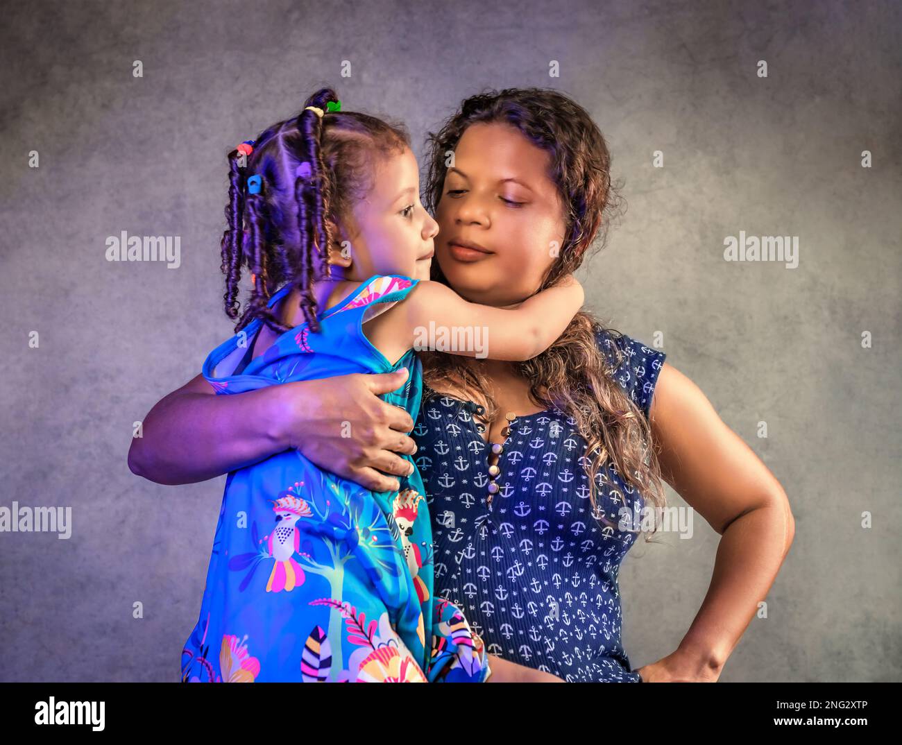 Mother And Daughter Hugging Smiling For Portrait Brazilian Black Women