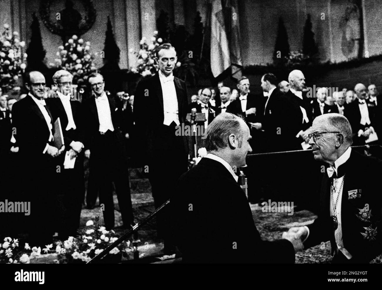 King Gustaf Adolf delivers the Nobel Prize to Dr. Francis Crick, (left ...