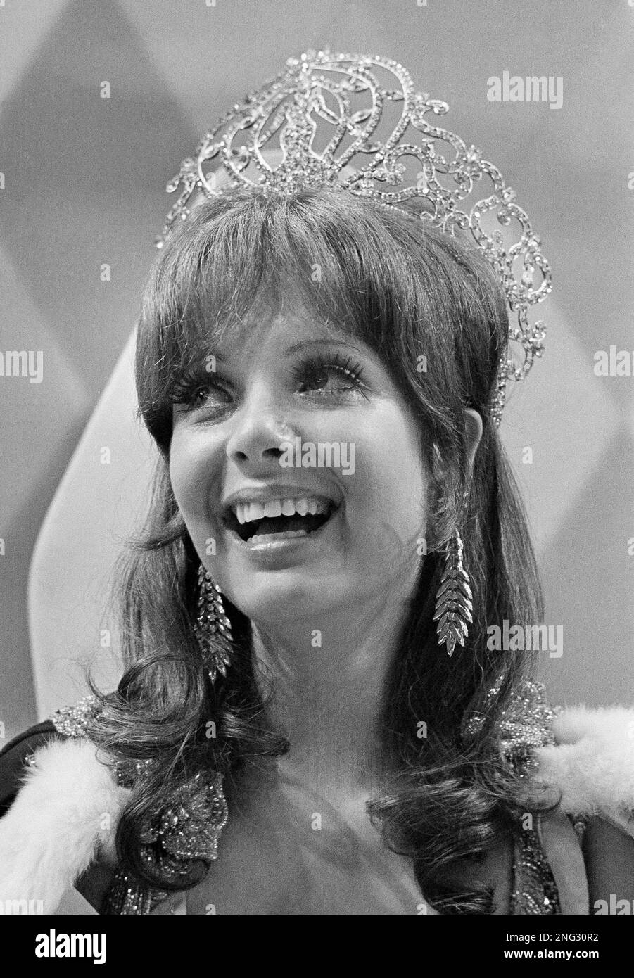 Marisol Malaret of Puerto Nuevo, Puerto Rico, smiles for the cameras as ...