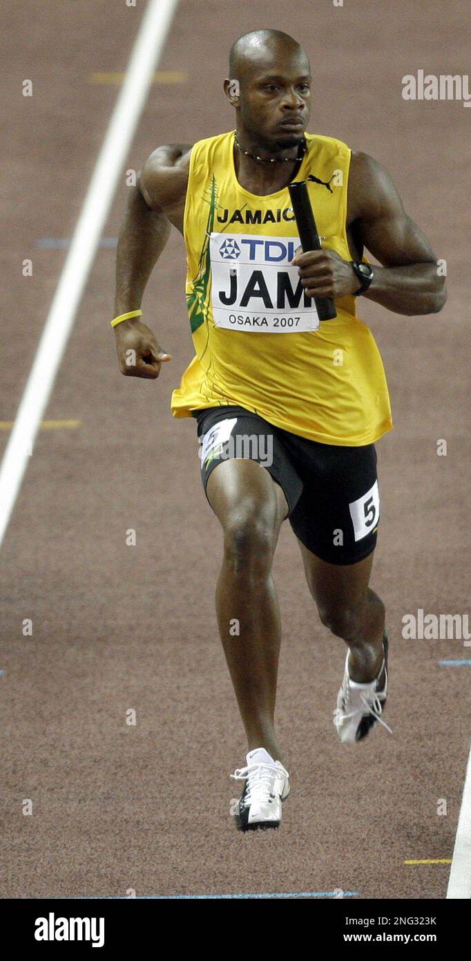 Jamaica's Asafa Powell runs in the 4x100m relay at the World Athletics ...