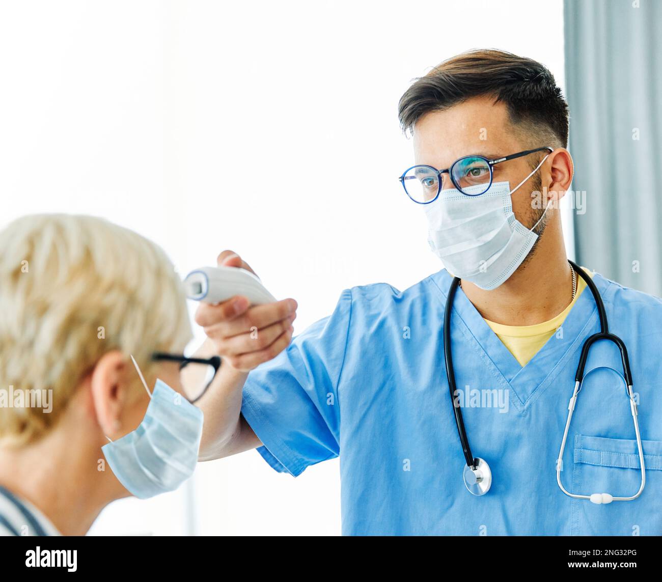 virus nurse doctor thermometer digital temperature medical senior woman ...